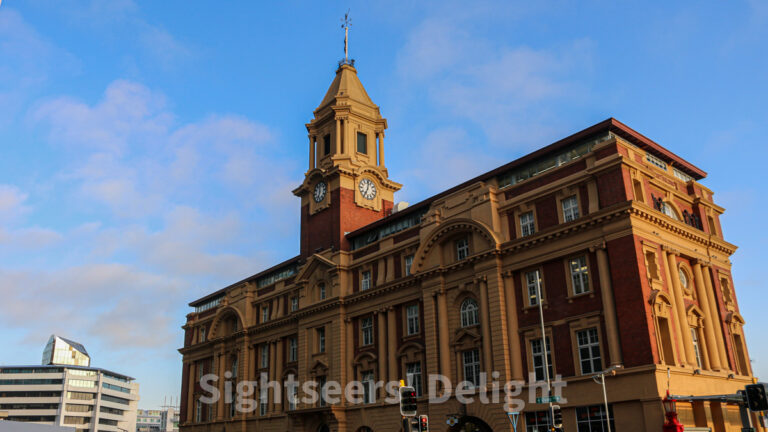 Police charge two for climbing Auckland Ferry Building - Sightseers ...